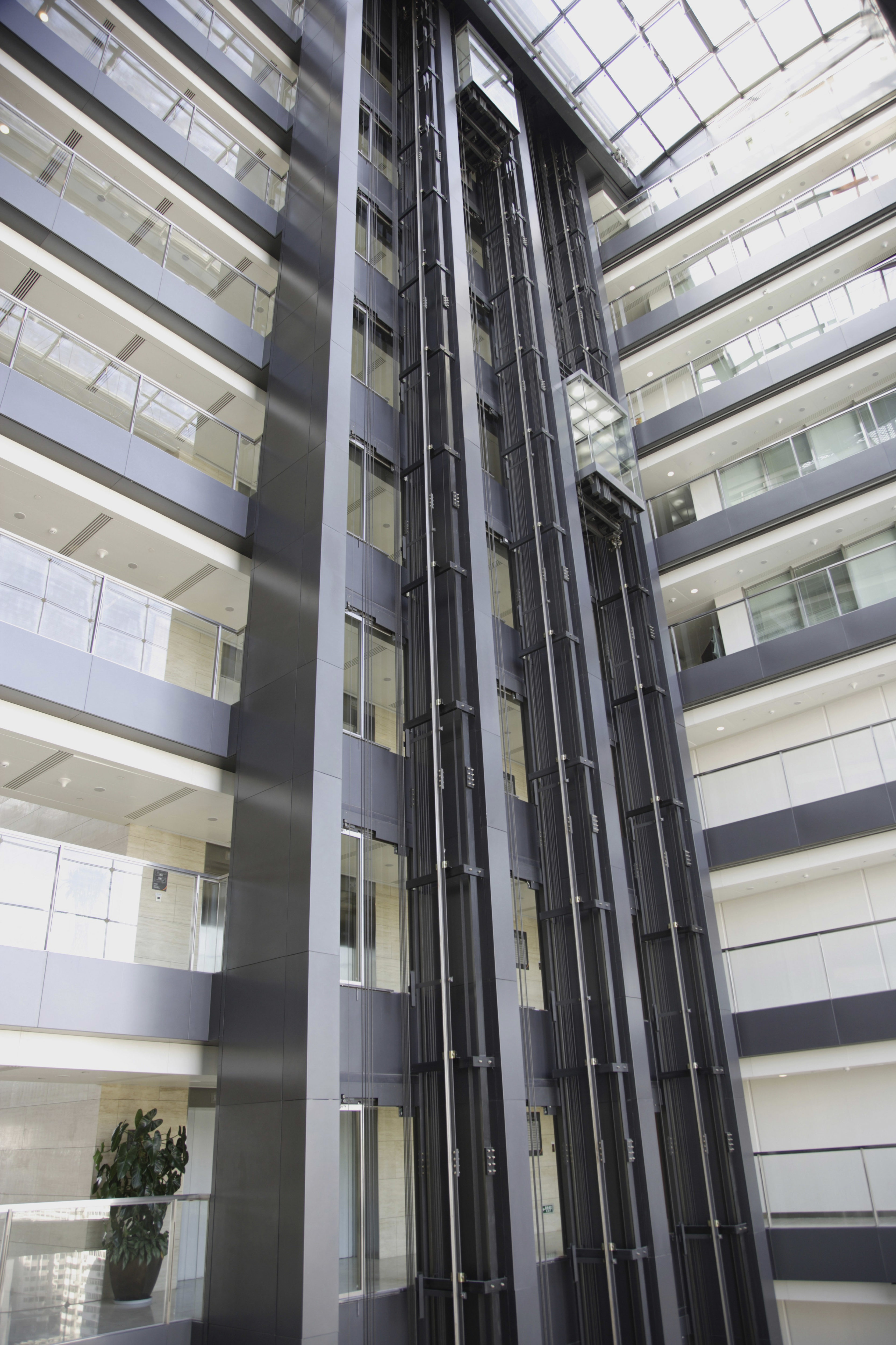 Building with glass elevator – TEKA Systems